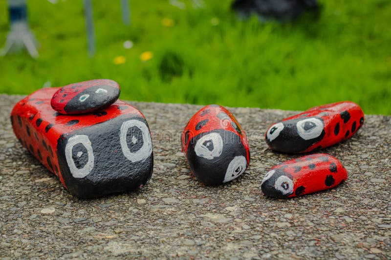 Rocks Painted Like Ladybugs Lie on the Curb Stock Image - Image of ...