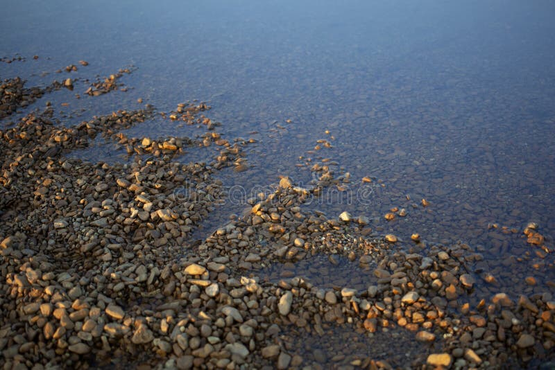 Rocks and Pebbles at the Lake Stock Photo - Image of pebbles, river ...
