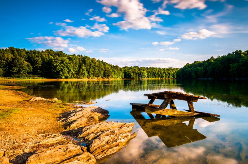 Rocks and a Picnic Table in Lake Marburg, at Codorus State Park ...