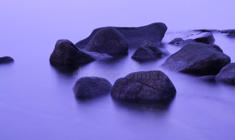 Rocks in a Purple Nordic Winter Sea Stock Photo - Image of shore, rocks ...