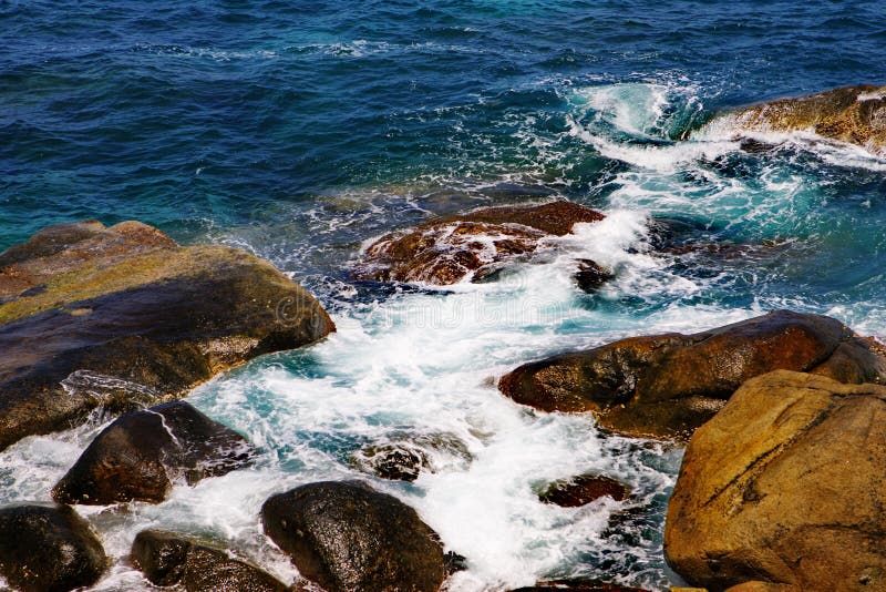Rocks and Reefs Under the Waves Stock Photo - Image of seaside, water ...