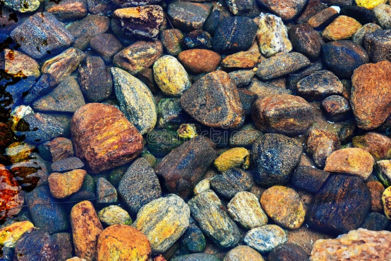 Rocks on a river bed stock photo. Image of riverbed, rocks - 90986854
