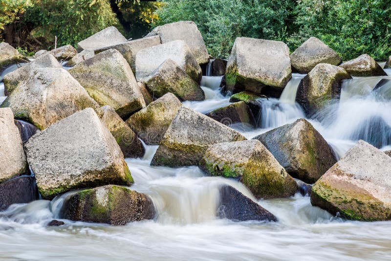 Rocks in the river stock photo. Image of artist, style - 57355700