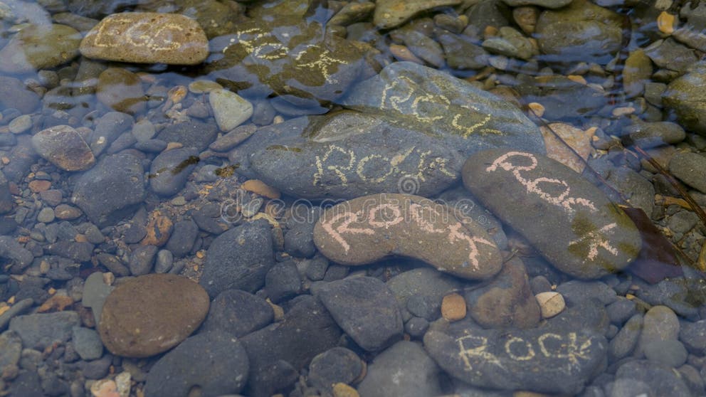 Rocks in the River, Labelled Rock Stock Photo - Image of water, labeed ...
