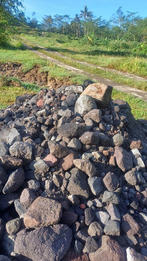 Rocks on the Road stock photo. Image of geological, sunny - 380818328