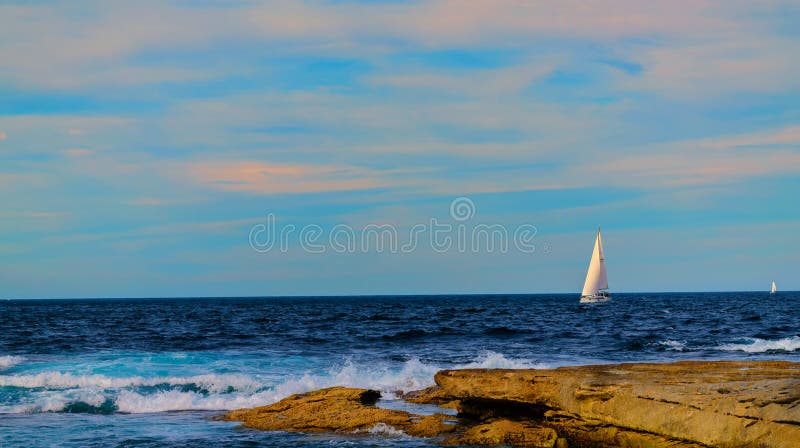 Rocks, Sailing Boats and Ocean at Sunset Stock Image - Image of marine ...