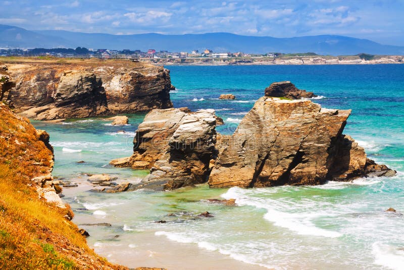 Rocks at sand beach stock image. Image of europe, coastline - 61595333