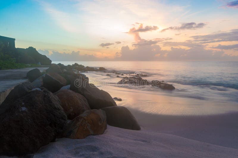 Rocks on the Sand at Sunset Stock Photo - Image of sunset, west: 80618142