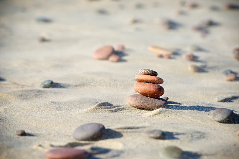 Rocks on the sand stock image. Image of tower, warm, plants - 62856571