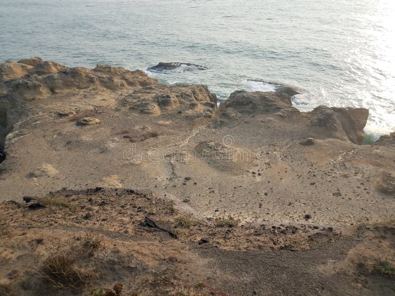 Rocks and Sand and Water on the Coast Stock Image - Image of beach ...