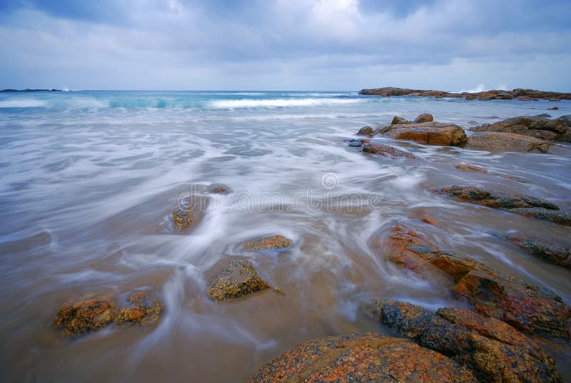 Rocks in the sea stock photo. Image of season, background - 12944344