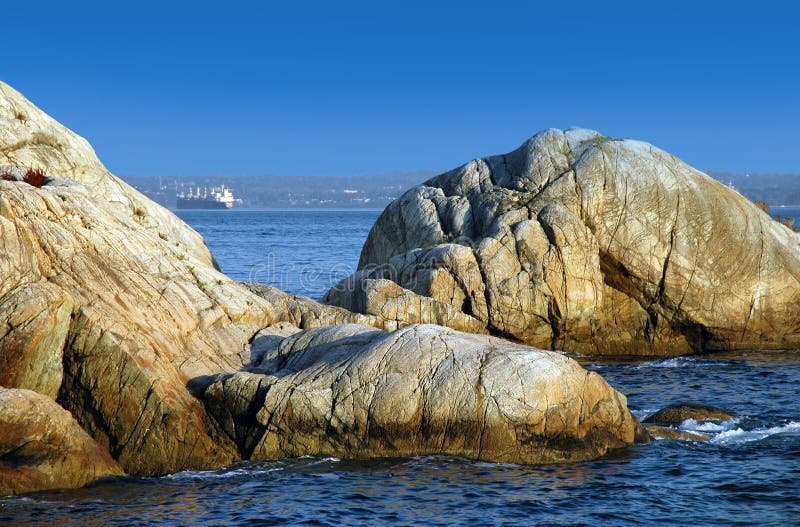 Rocks in the sea stock image. Image of stone, shore, beach - 23165007