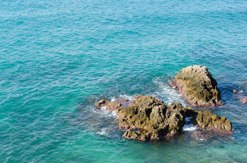 Rocks in the sea stock photo. Image of scene, clear, seascape - 28170722
