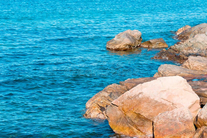 Rocks in the sea stock photo. Image of blue, stones, rocks - 29673104