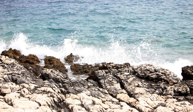 Rocks at sea stock photo. Image of pacific, beautiful - 63565356