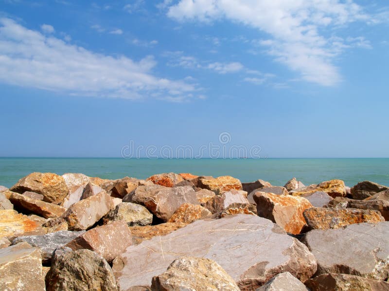 Rocks by the sea stock photo. Image of turquoise, strong - 717188