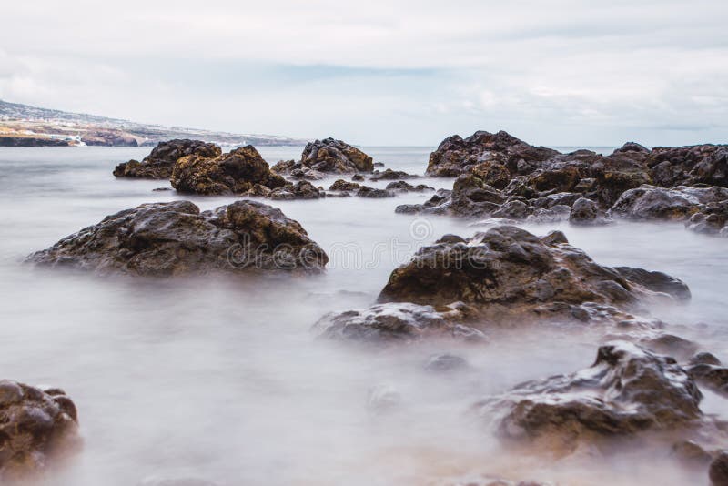 Rocks in the Sea in Long Exposure Stock Image - Image of beach, rock ...