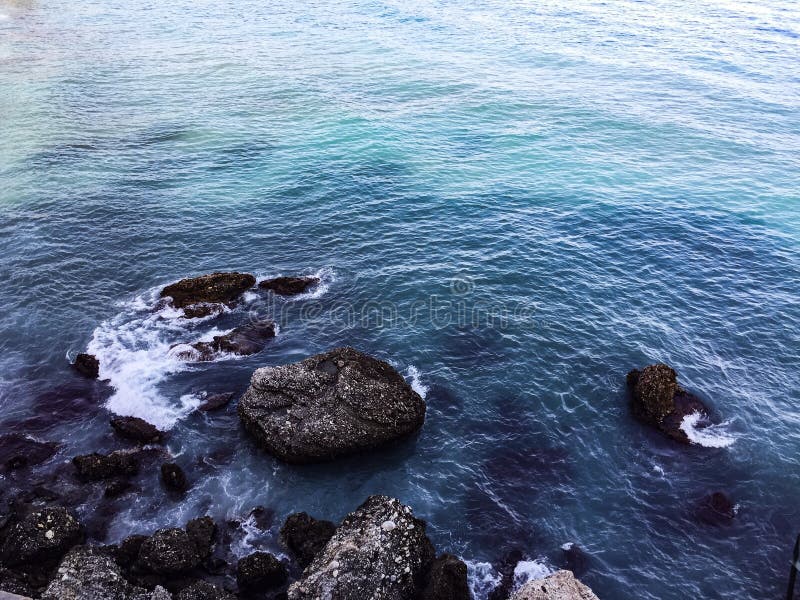 Rocks on the Sea in Nerja, Andalusia, Spain Stock Photo - Image of ...