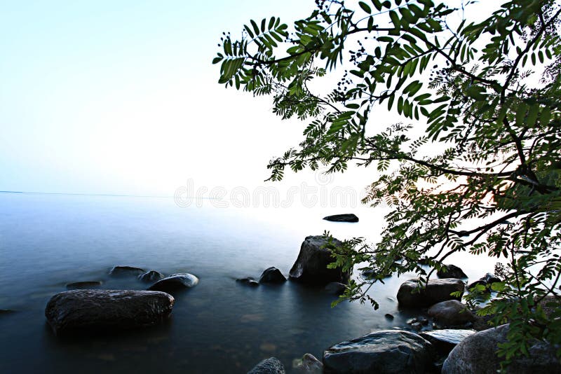 Rocks sea shore blue stock photo. Image of shore, blue - 50666102