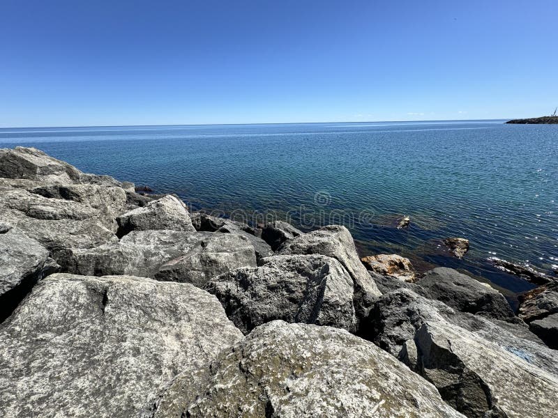 Rocks in the Sea. Tree Fragments from Water. Sea Landscape with Rocks ...