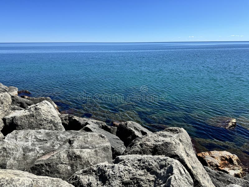 Rocks in the Sea. Tree Fragments from Water. Sea Landscape with Rocks ...