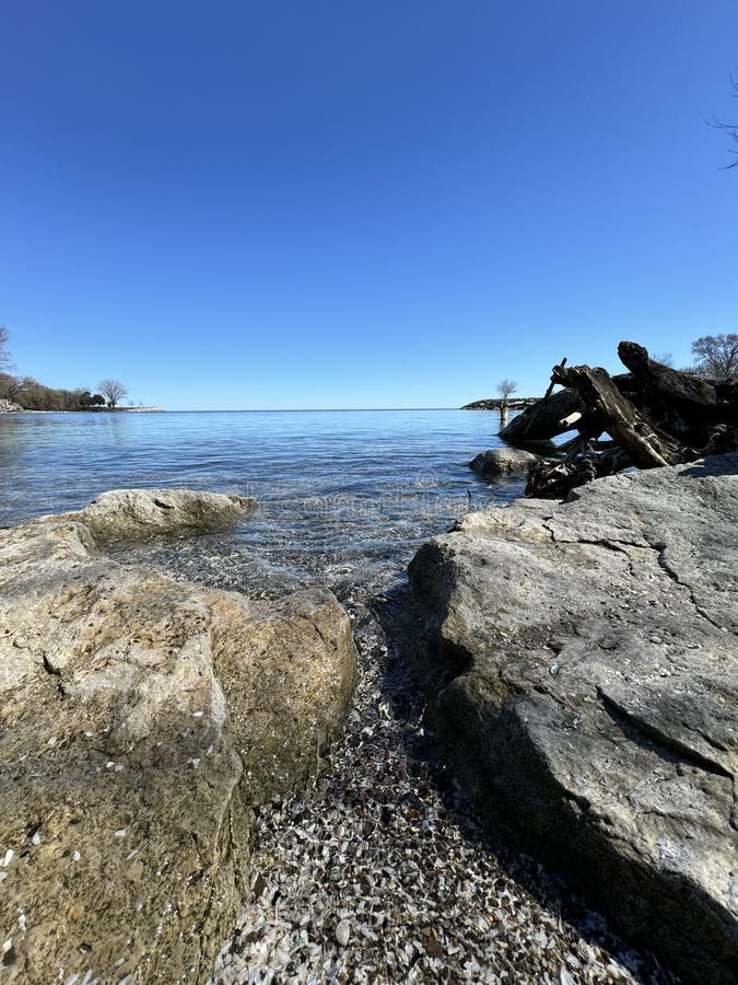 Rocks in the Sea. Tree Fragments from Water. Sea Landscape with Rocks ...