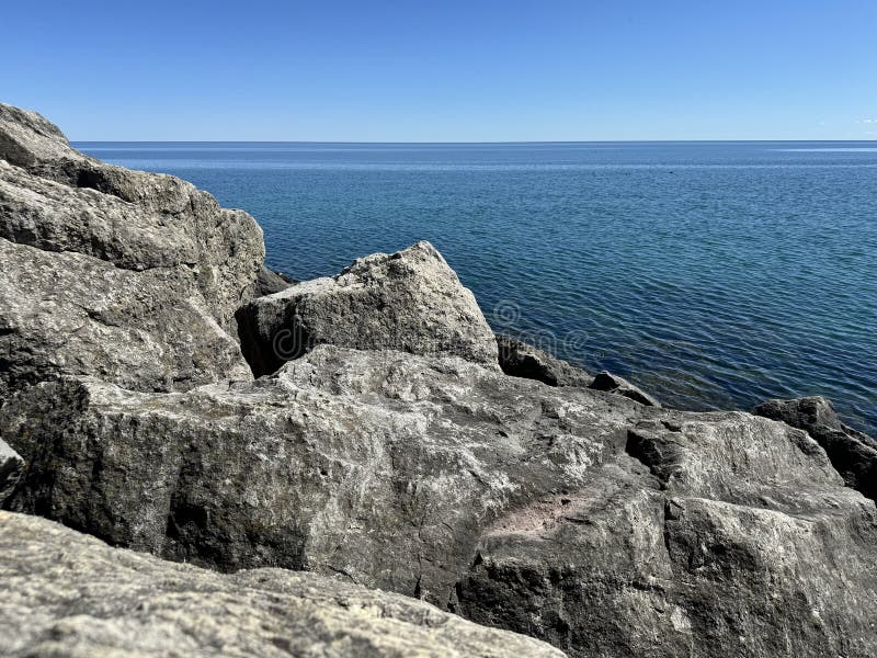 Rocks in the Sea. Tree Fragments from Water. Sea Landscape with Rocks ...