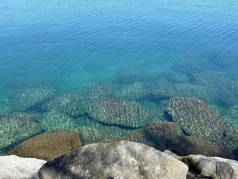 Rocks in the Sea. Tree Fragments from Water. Sea Landscape with Rocks ...