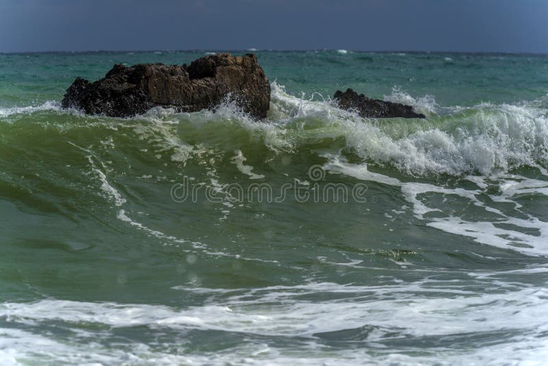 Rocks in the sea and waves stock image. Image of fresh - 231856261