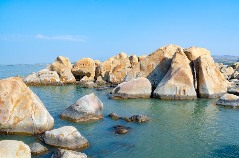 Rocks by the seashore stock photo. Image of stone, travel - 345032396