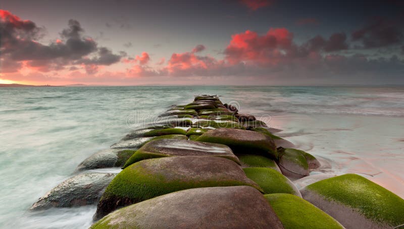 Rocks by seashore stock photo. Image of rise, rocky, nature - 34494168