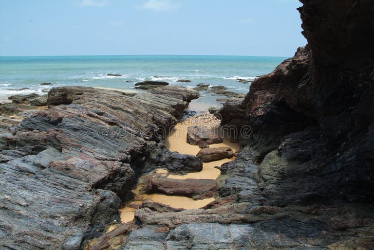 Rocks by the seaside stock image. Image of surfaces, clear - 1870919