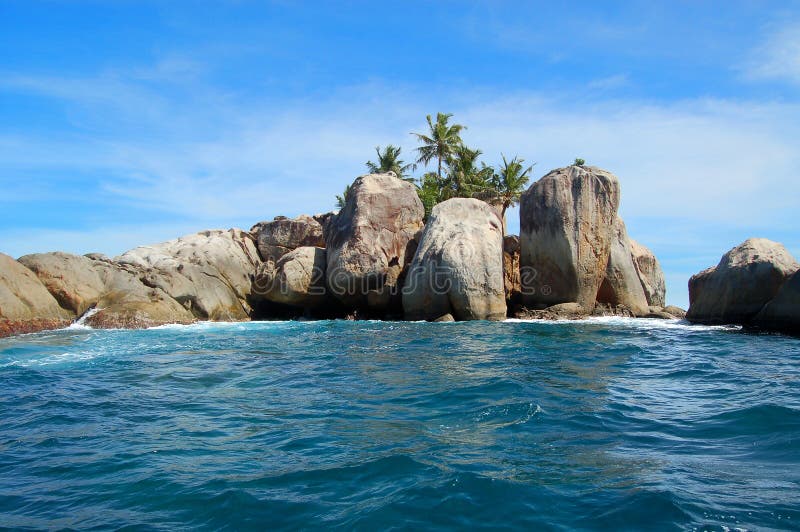 Rocks on Seychelles coast stock image. Image of shoreline - 11691595