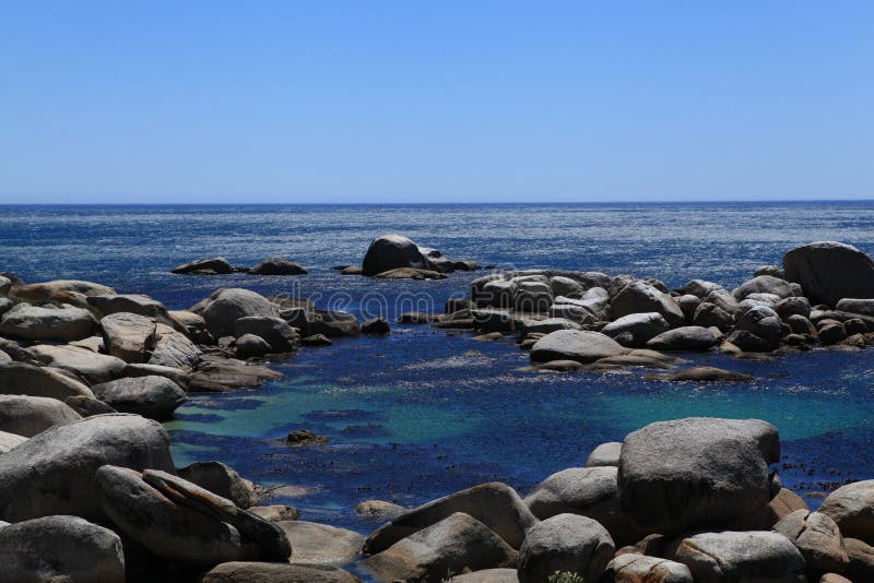Rocks on shore stock photo. Image of haze, rock, stones - 28898468