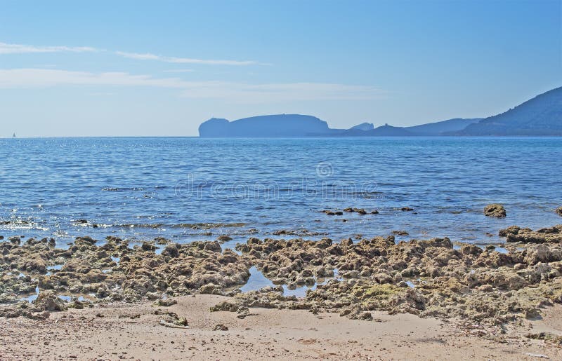 Rocks by the shore stock photo. Image of coast, sardinia - 54038436