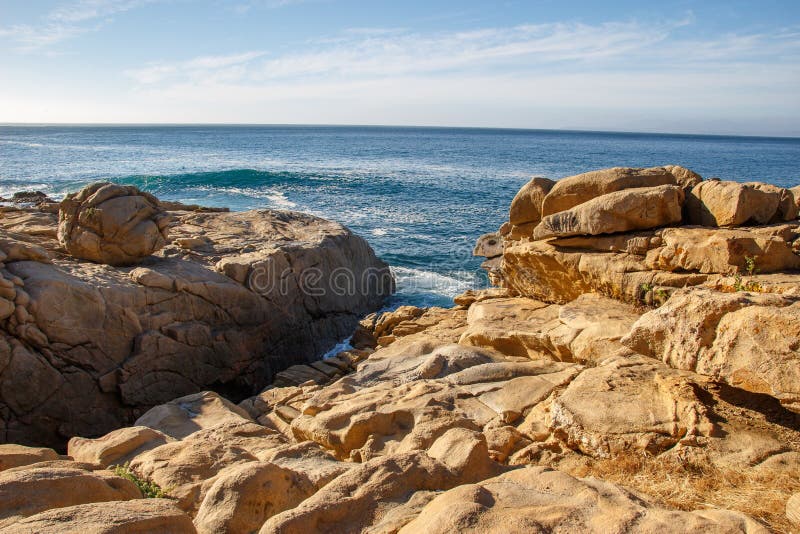 Rocks on the Shore of the Sea on a Sunny Day Stock Photo - Image of ...