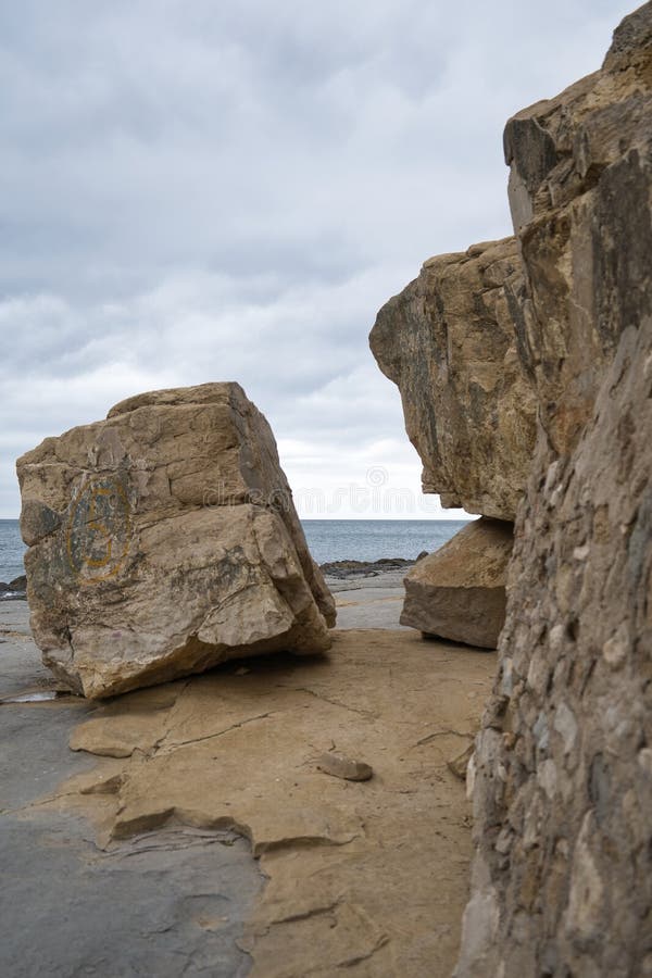 Rocks on the Shoreline of a Beach Stock Image - Image of mineral ...