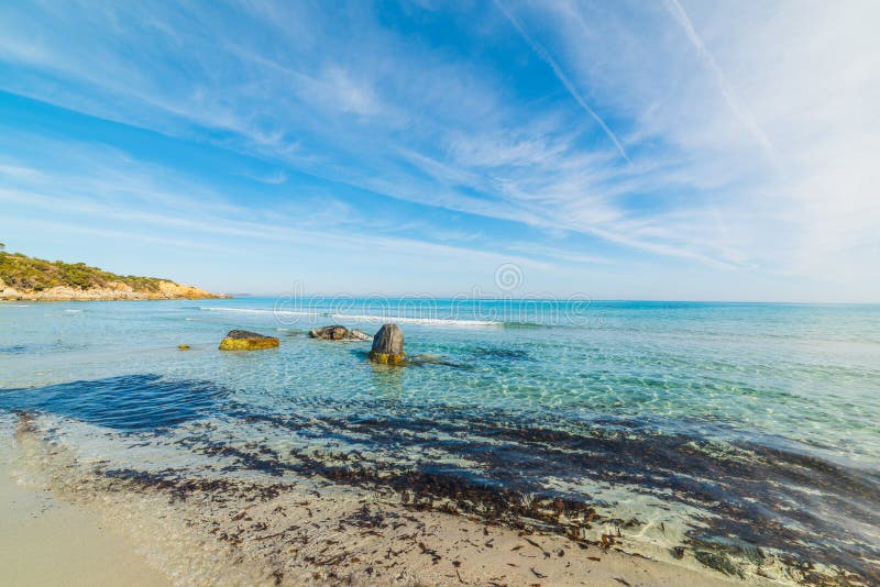 Rocks in Simius beach stock image. Image of water, coastline - 90955391