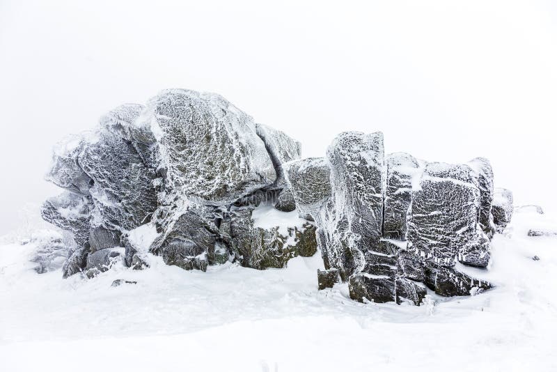 Rocks in the Snow in Front of a Blizzard Stock Image - Image of design ...