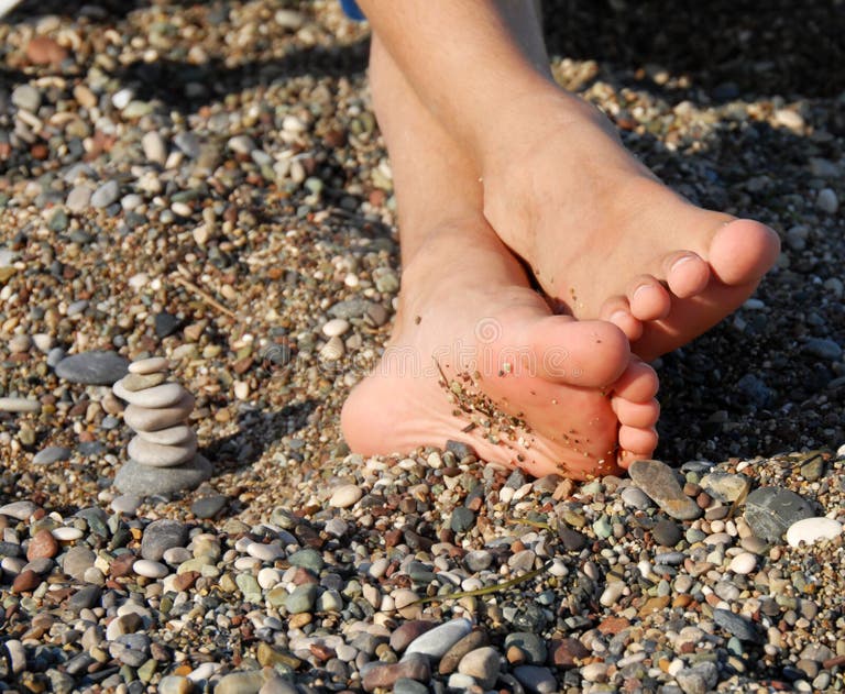Rocks stack and boy feet stock photo. Image of feet, enjoy - 11109816
