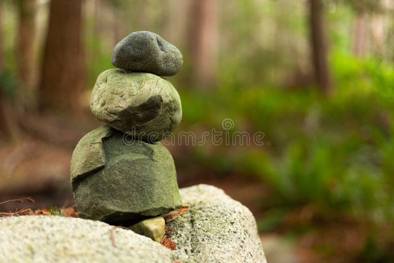 Rocks Stacked on a Large Boulder in a Forest Stock Photo - Image of ...