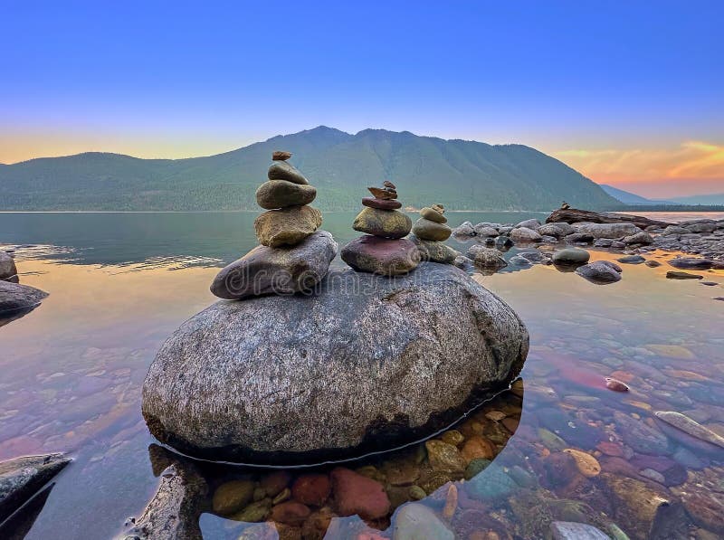Rocks Stacked on a Large Boulder at Glacier National Park, MT Stock ...