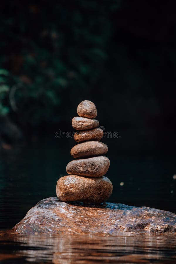 Rocks stacked together stock image. Image of stacked - 213959297