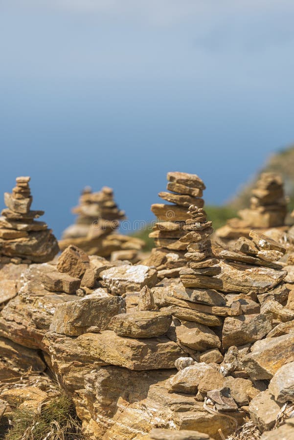 The Rocks Have Stacks and Pebbles on it Against the Backdrop of a Large ...