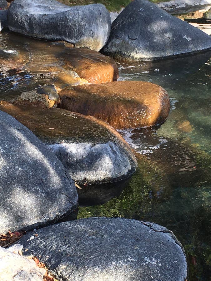 Rocks in Stream stock photo. Image of colored, stream - 118042804