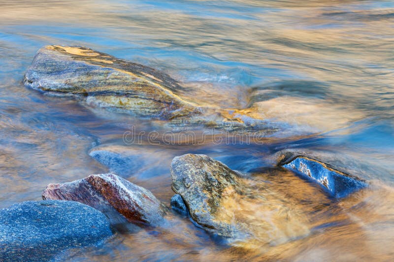 Rocks in a Stream with Flowing Water Stock Image - Image of boulder ...