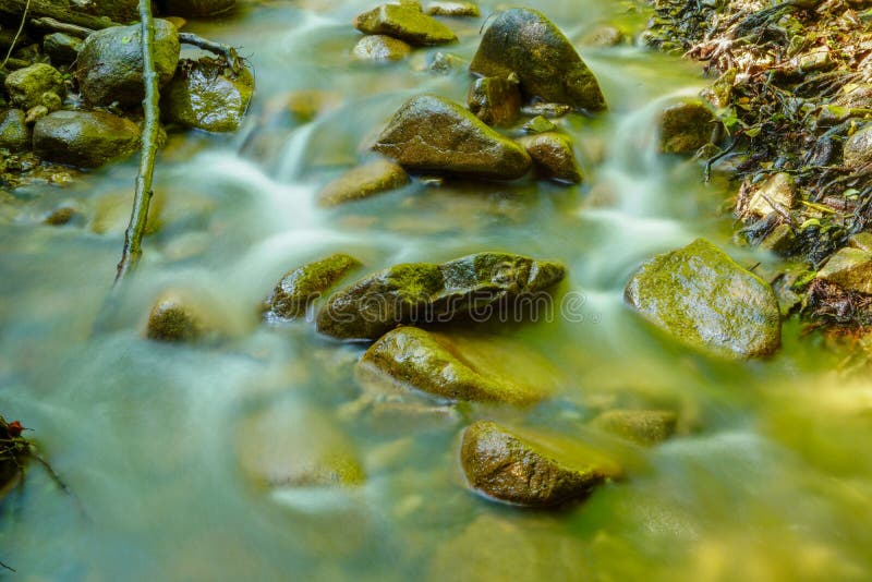 Rocks Surrounded by a River Long Exposure Stock Photo - Image of ...