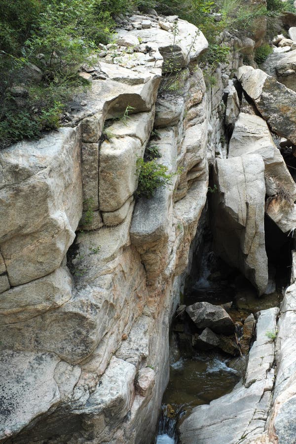 Rocks Surrounding Creek stock photo. Image of asis, details - 25848778