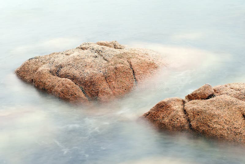 Rocks in swirling water stock photo. Image of scene, landscape - 19260544