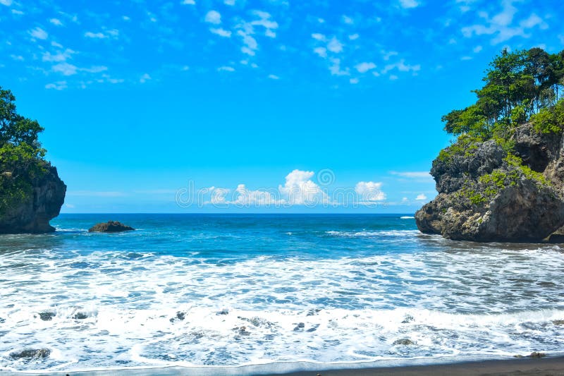 2 Rocks Towering Above the Sea Water Stock Photo - Image of towering ...